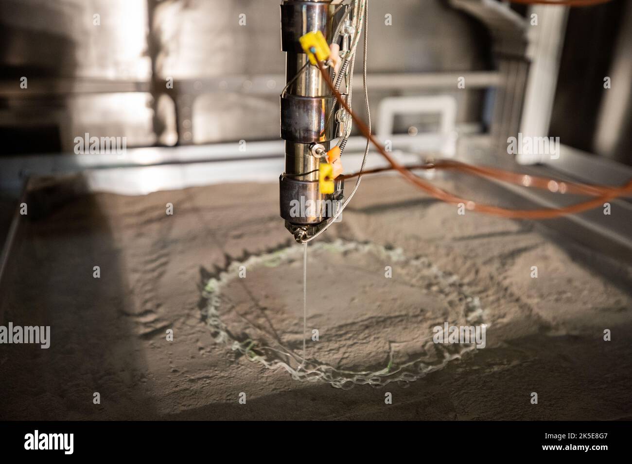 A team at NASA’s Kennedy Space Center in Florida test a 3D printer ...