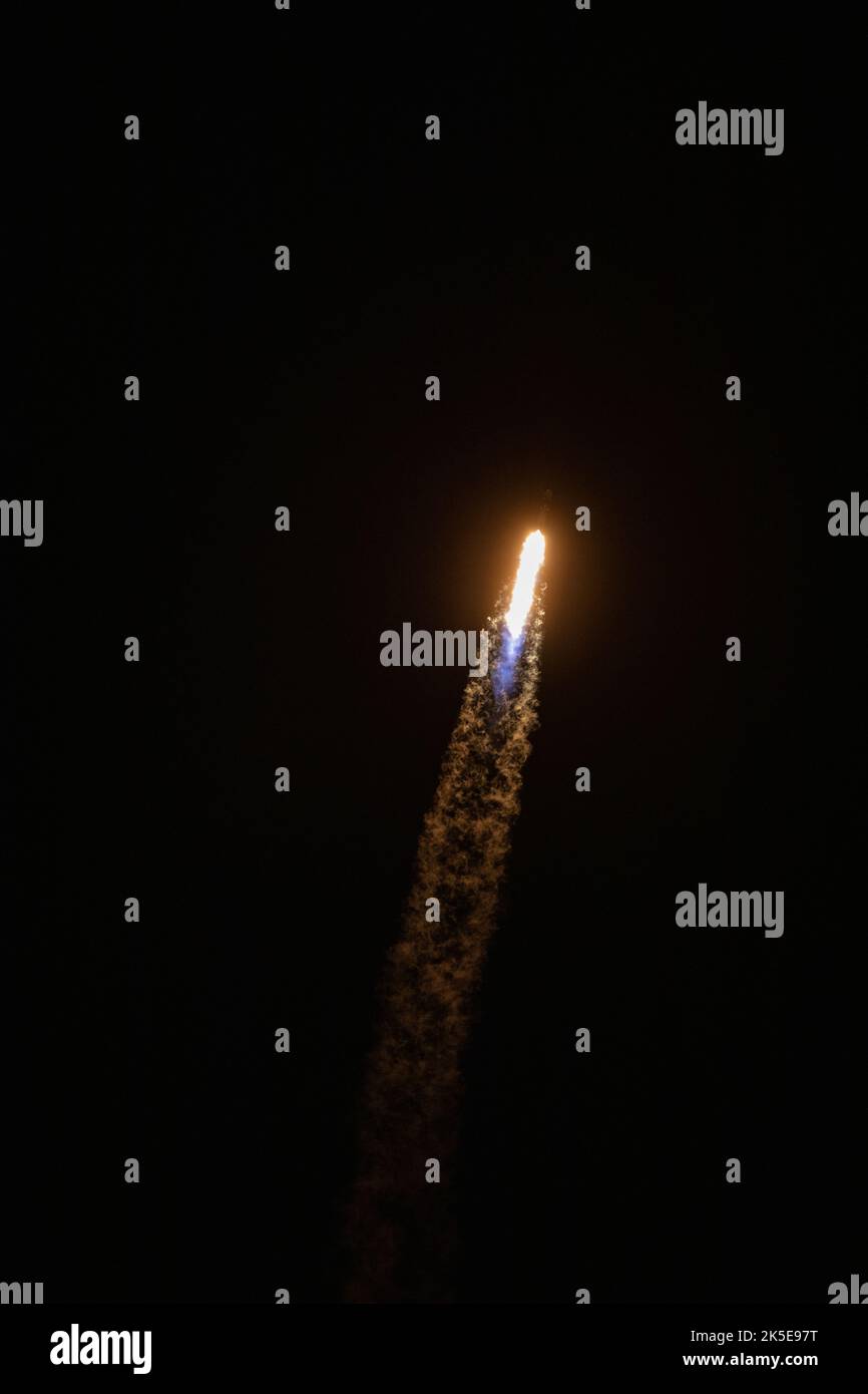The SpaceX Falcon 9 rocket, with the company’s Crew Dragon atop, soars ...
