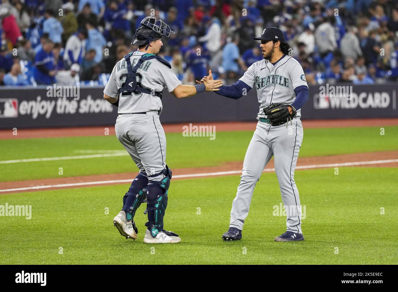 Toronto, Canada. 07th Oct, 2022. Seattle Mariners catcher Cal Raleigh and relief pitcher Andres ...