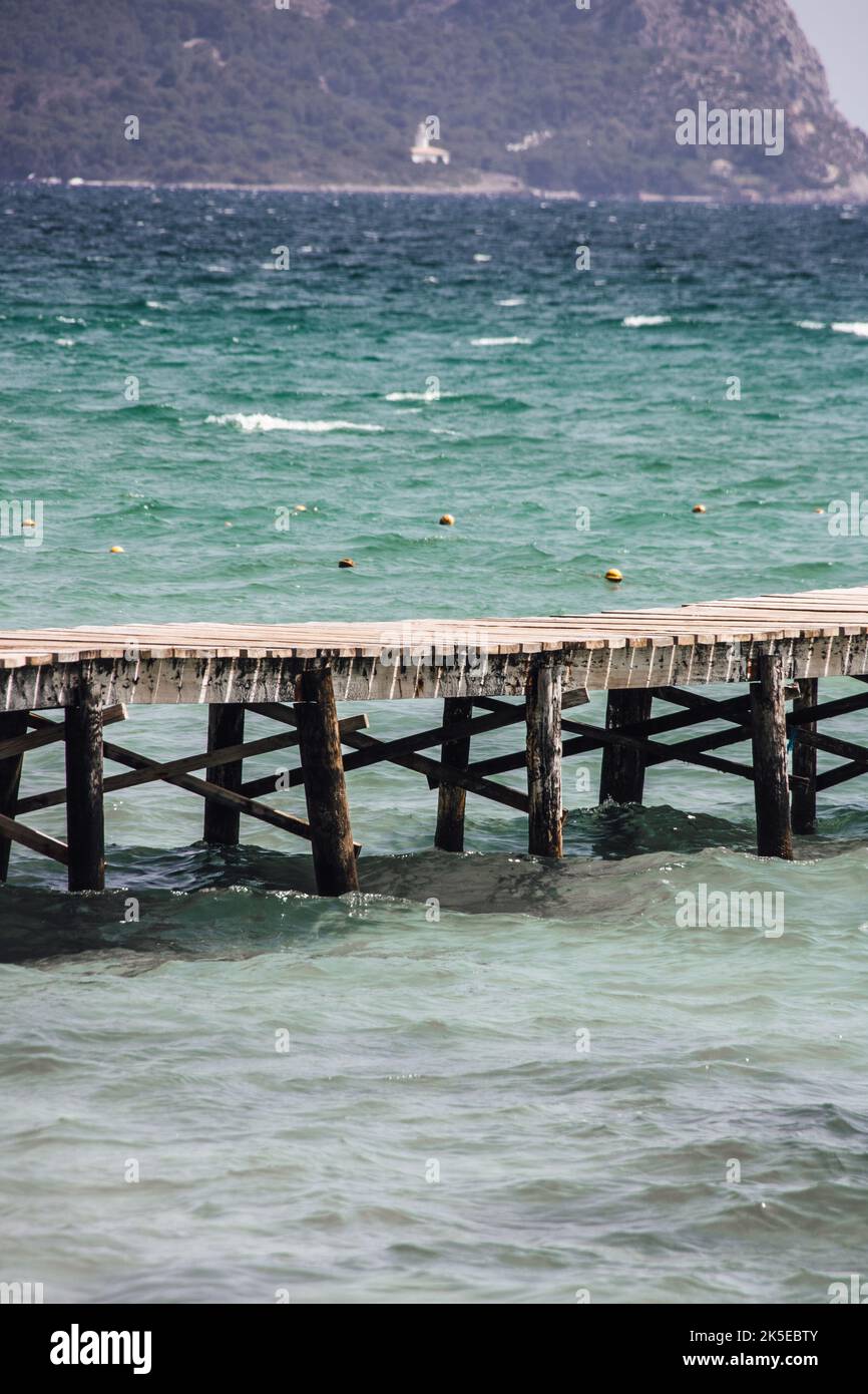 A wooden platform over the beach during summer Stock Photo - Alamy