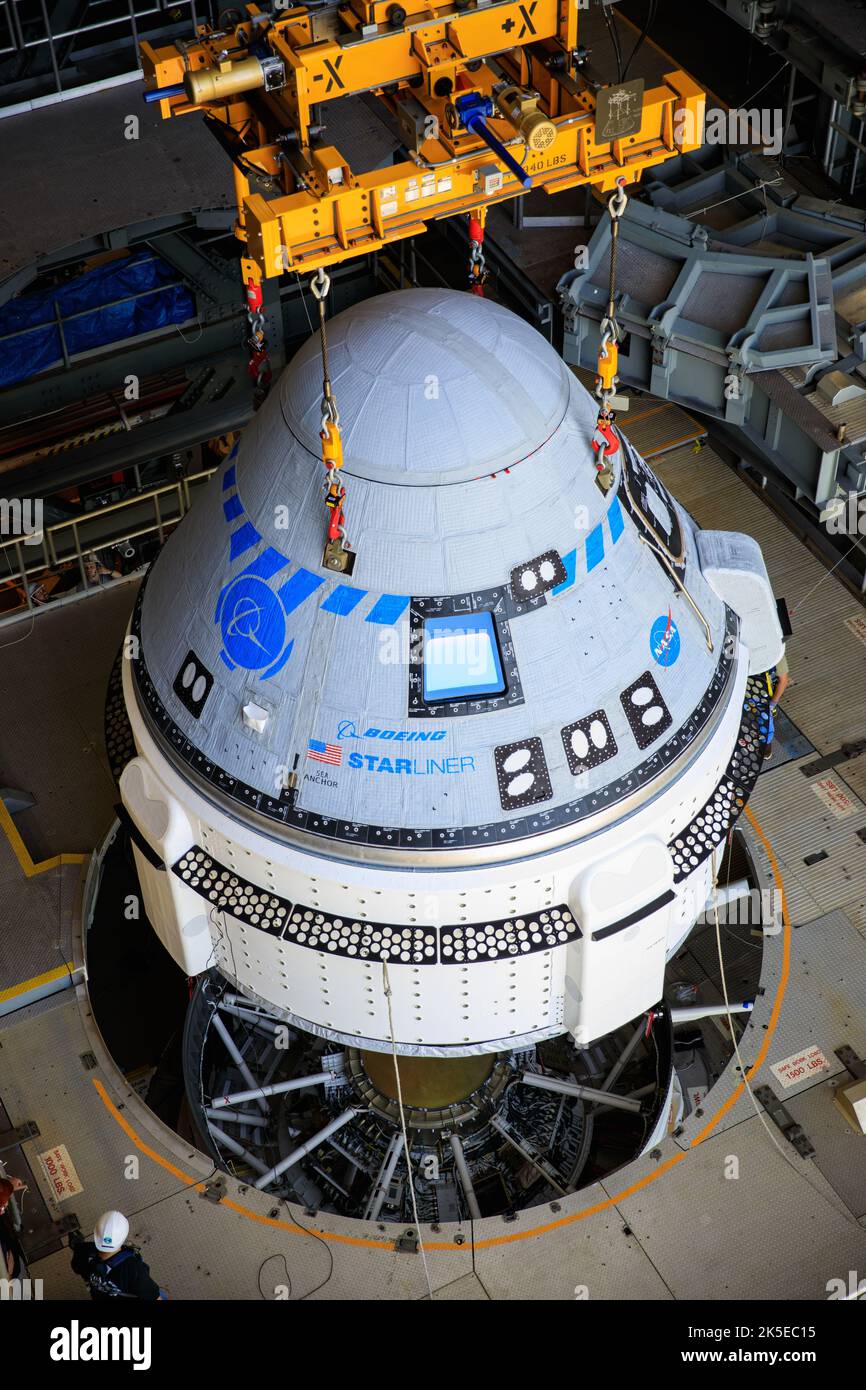 The Boeing CST-100 Starliner spacecraft is lifted at the Vertical ...