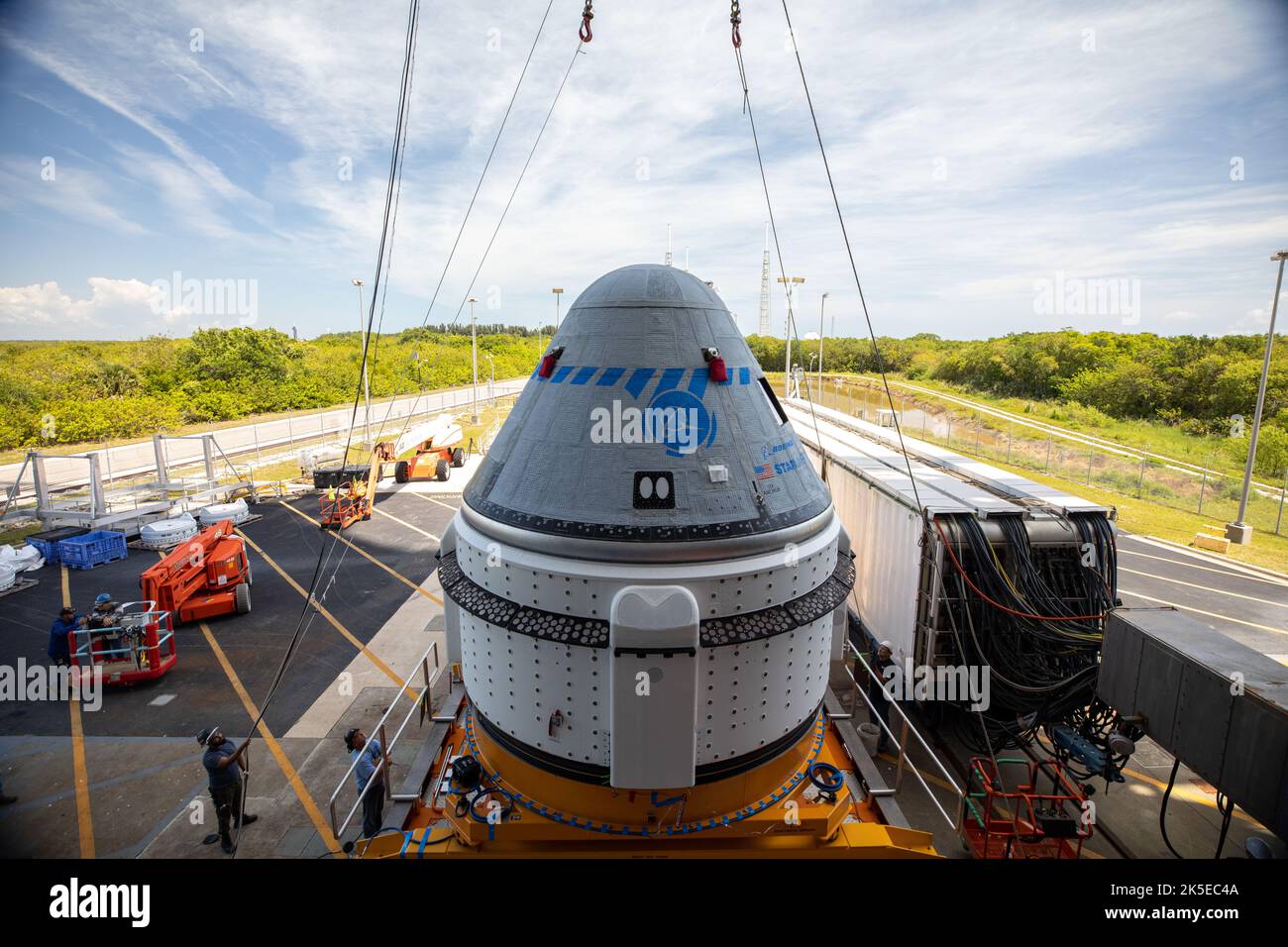 Boeing’s CST-100 Starliner spacecraft rolls out from the company’s ...