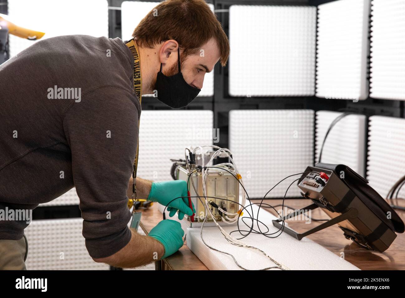 Nate Cain performs EMI testing on the MSolo engineering unit at Kennedy ...