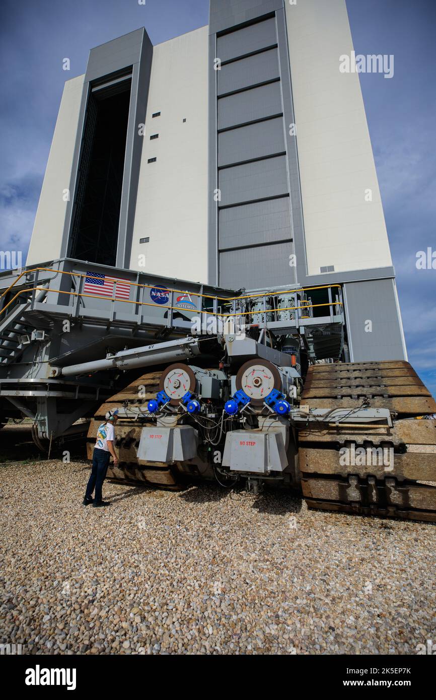 The crawler-transporter, driven by engineers, approaches the Vehicle ...