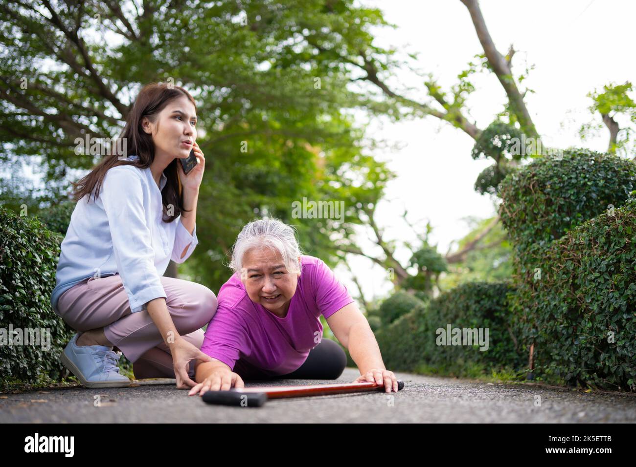 Asian senior woman fell down on lying floor because faint and limb ...