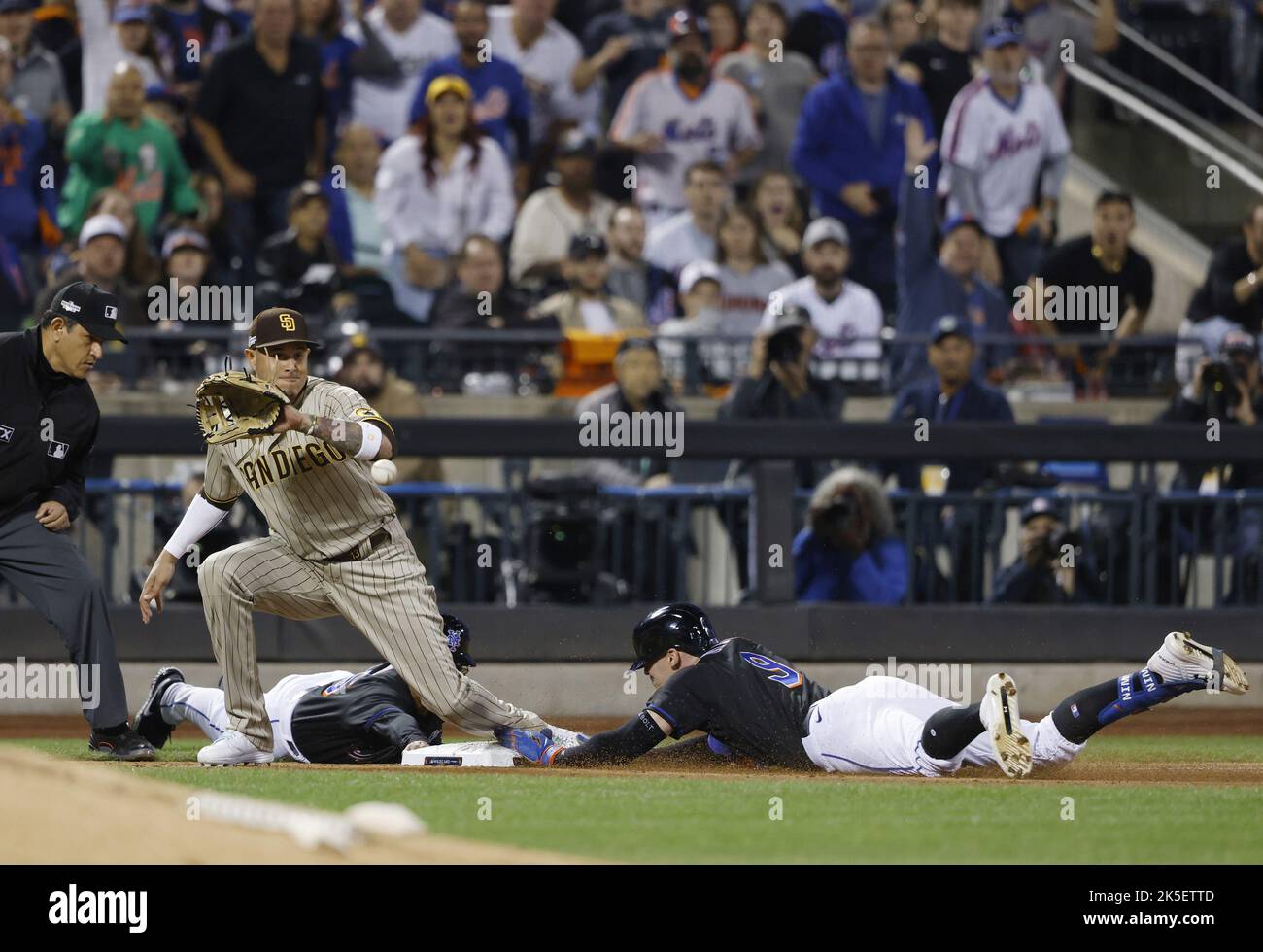 New York, USA. 07th Oct, 2022. New York Mets Brandon Nimmo dives into third base with a triple ...