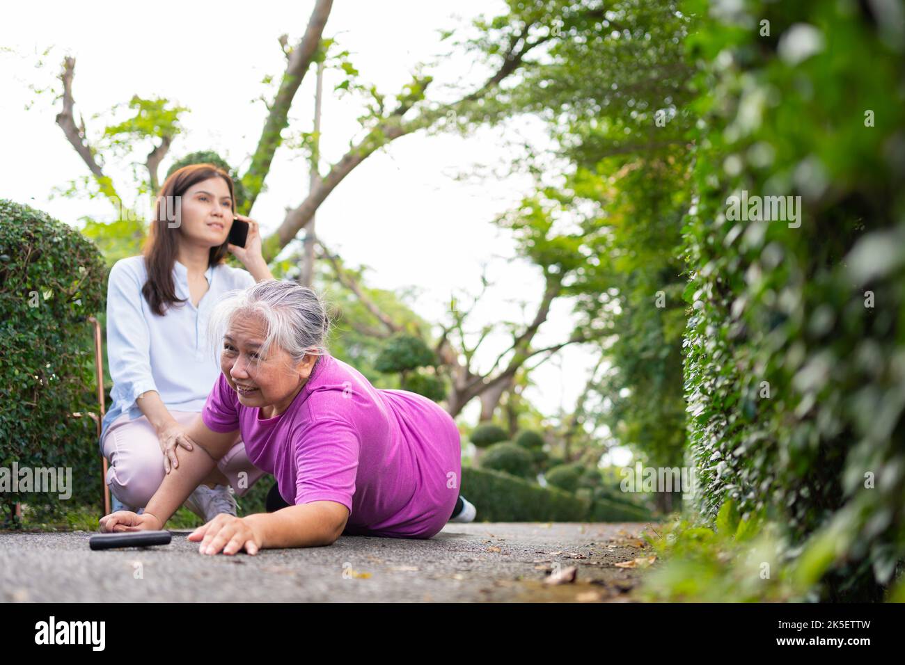 Asian senior woman fell down on lying floor because faint and limb ...