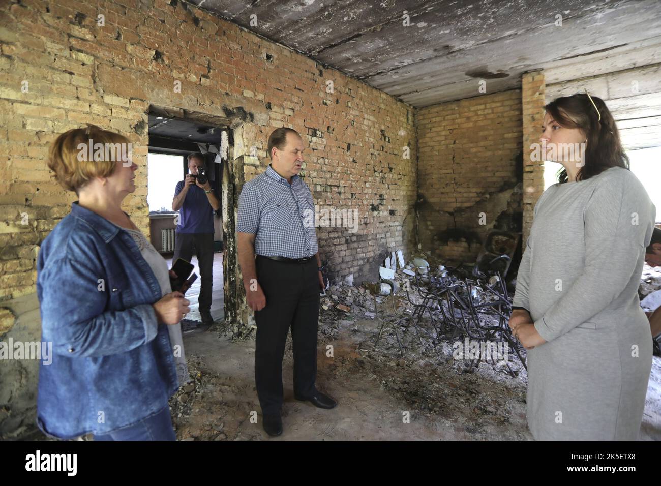 A senior official (R) of the Center for Civil Liberties hears from ...