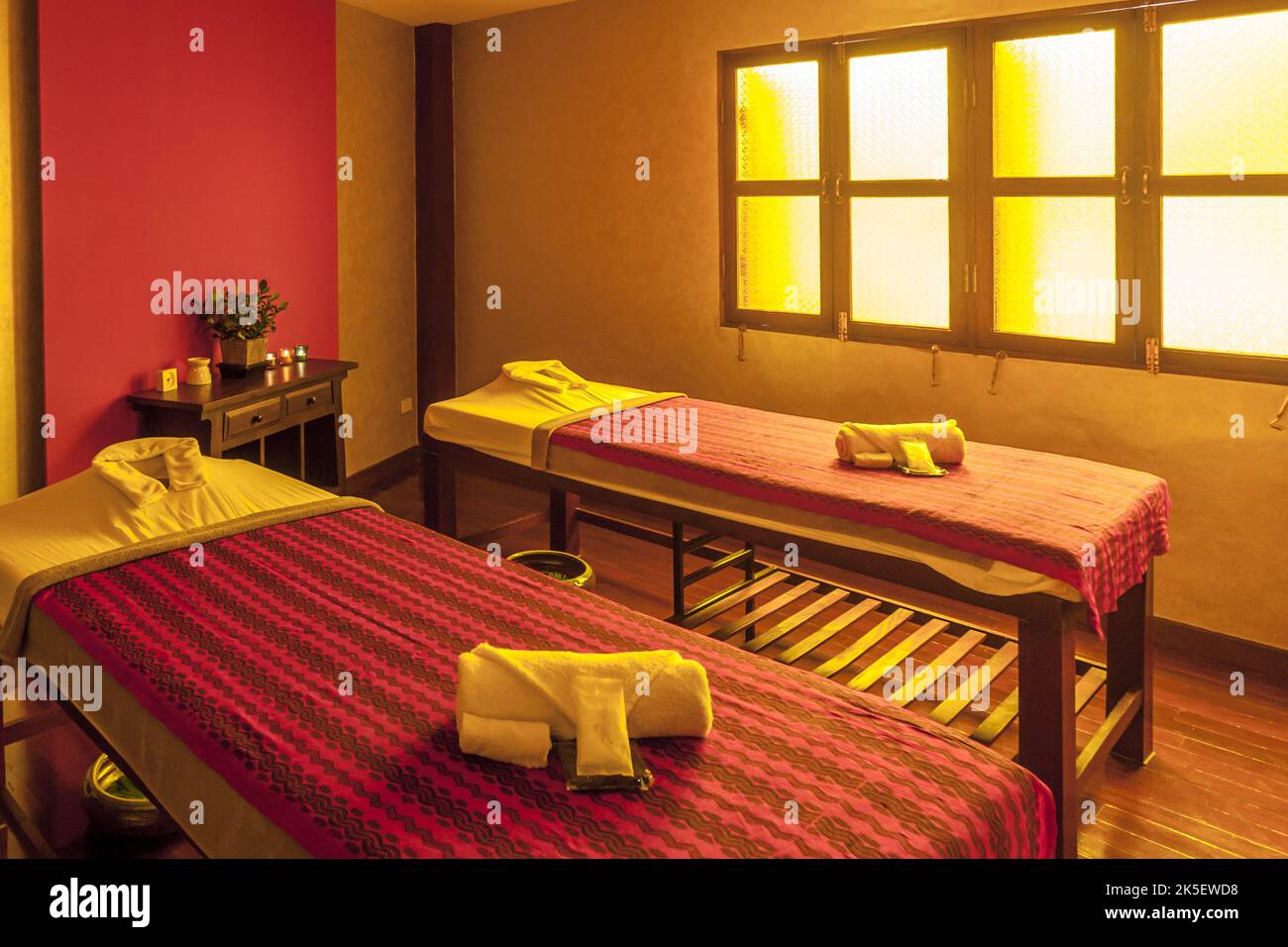 Massage tables line the room at a spa in SE Asia Stock Photo - Alamy