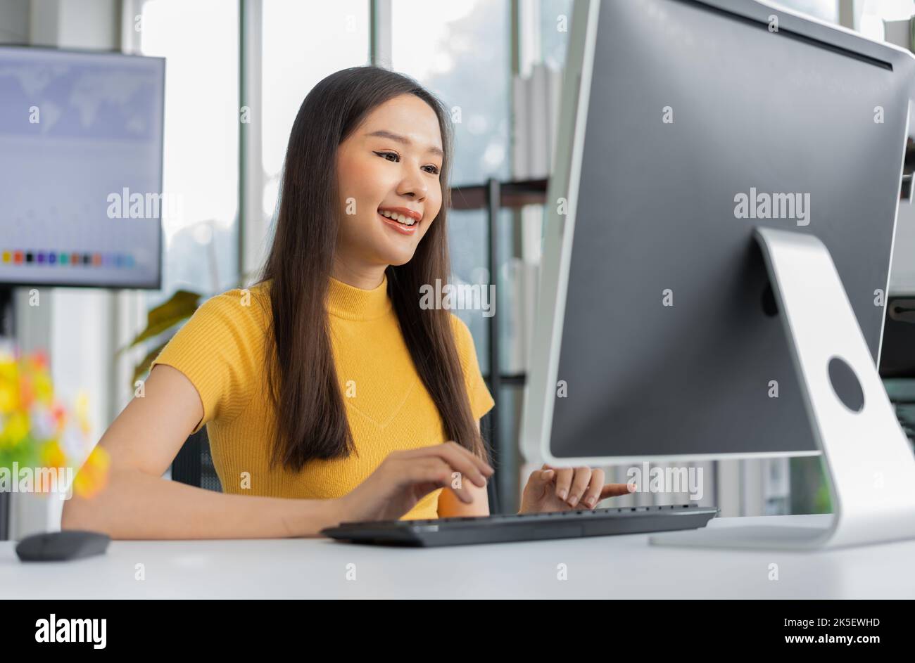 Portrait happy young programmer Asian woman work at start up technology ...