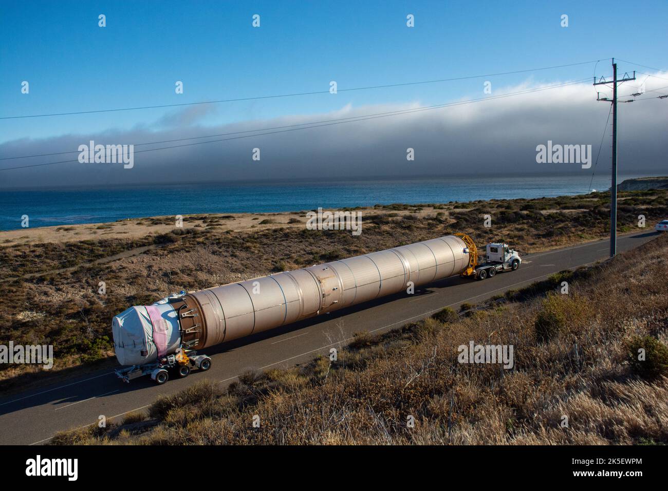 The United Launch Alliance (ULA) Atlas V booster is transported to the ...