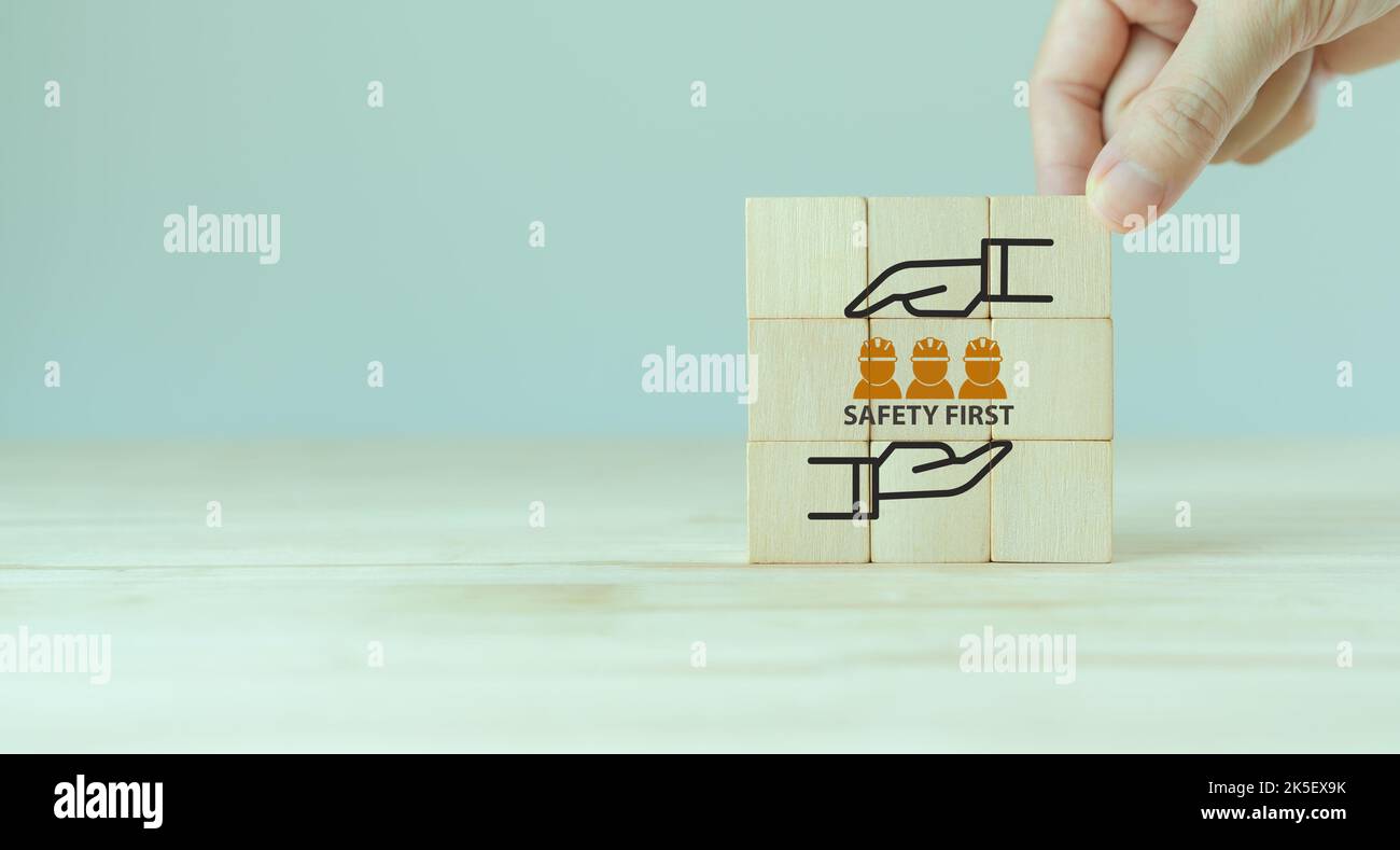 Safety first symbols, work safety, caution work hazards, danger ...