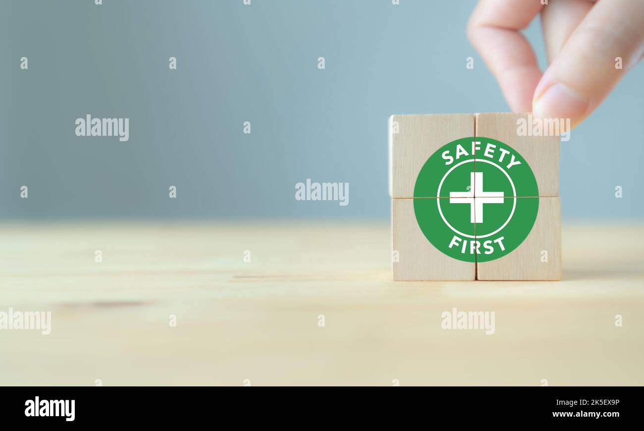 Safety first symbols, work safety, caution work hazards, danger ...