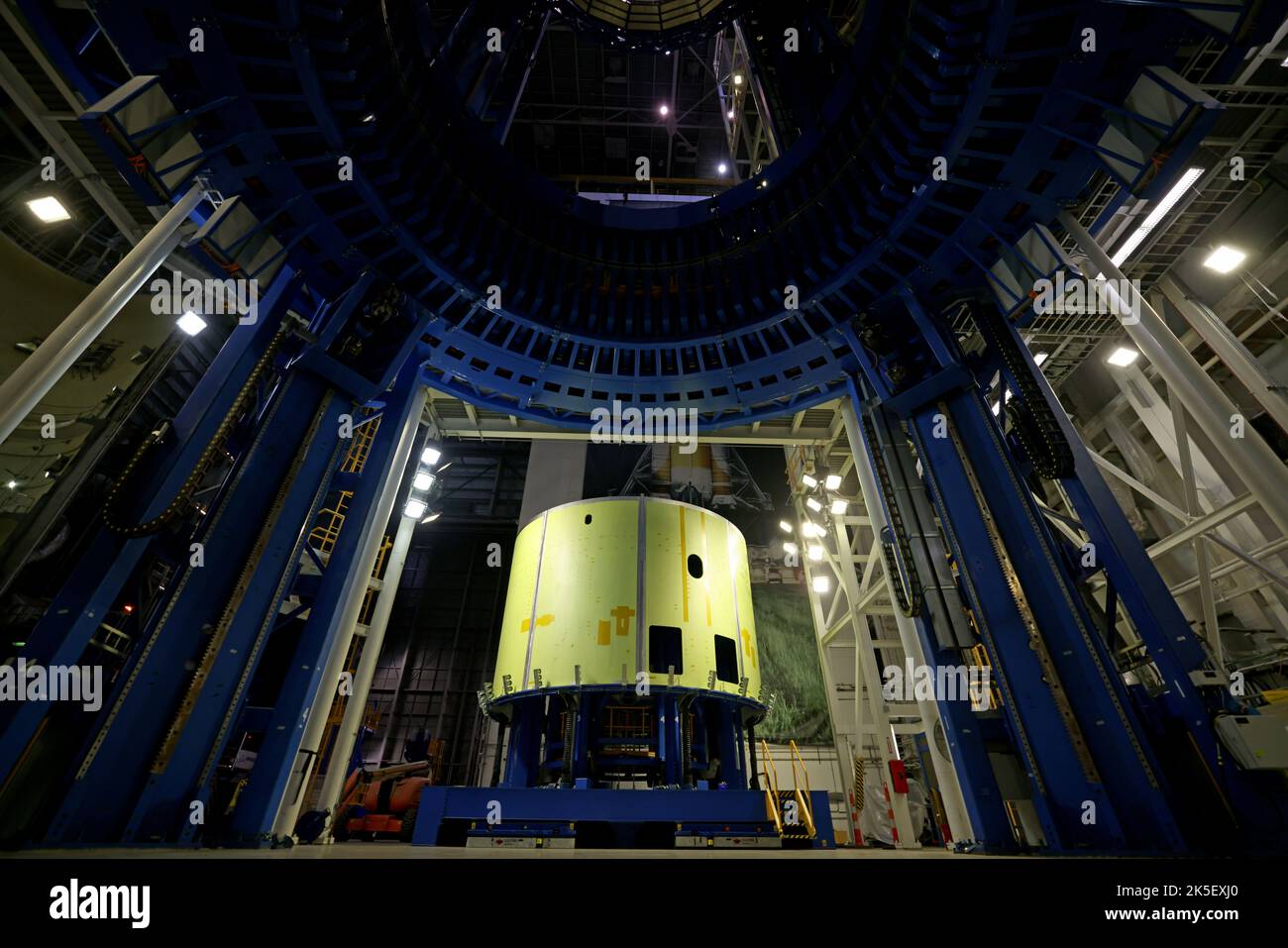 NASA technicians move the engine section of the Space Launch System ...
