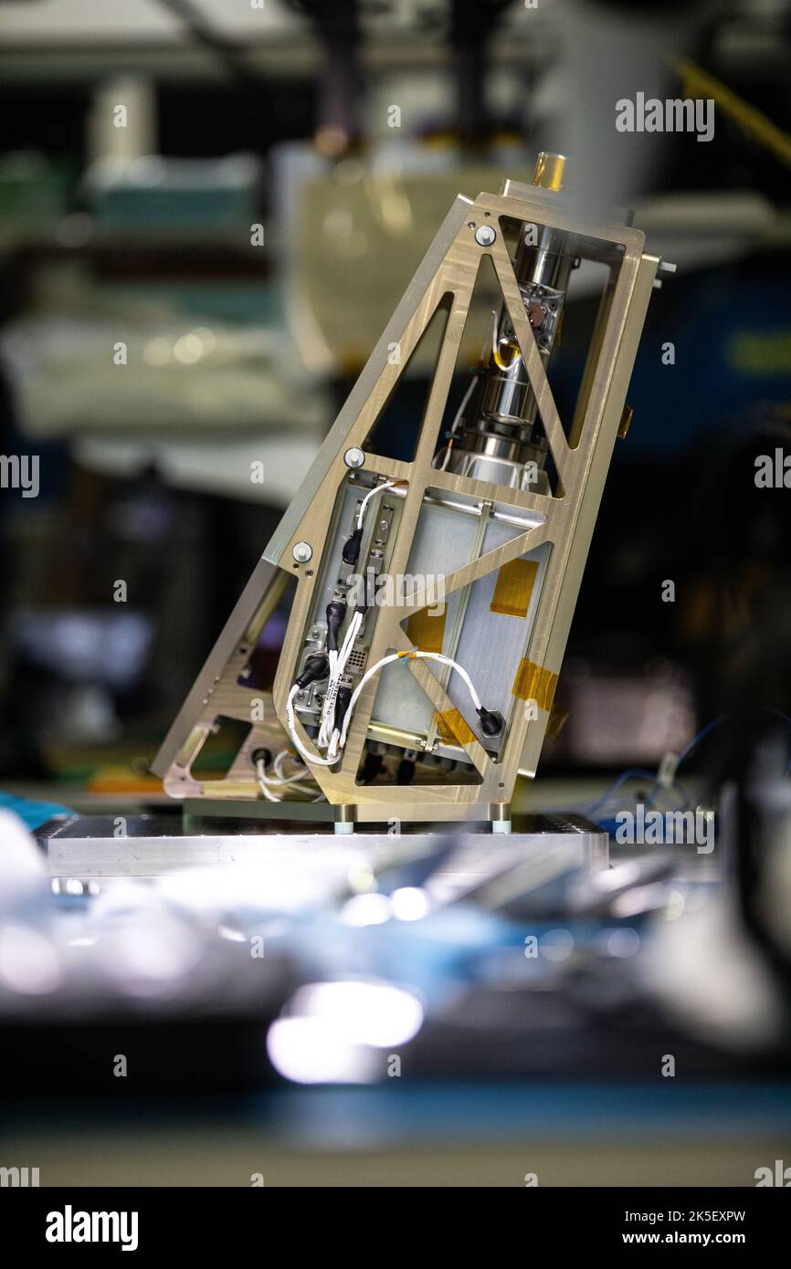 Engineers at NASA’s Kennedy Space Center in Florida remove the ...