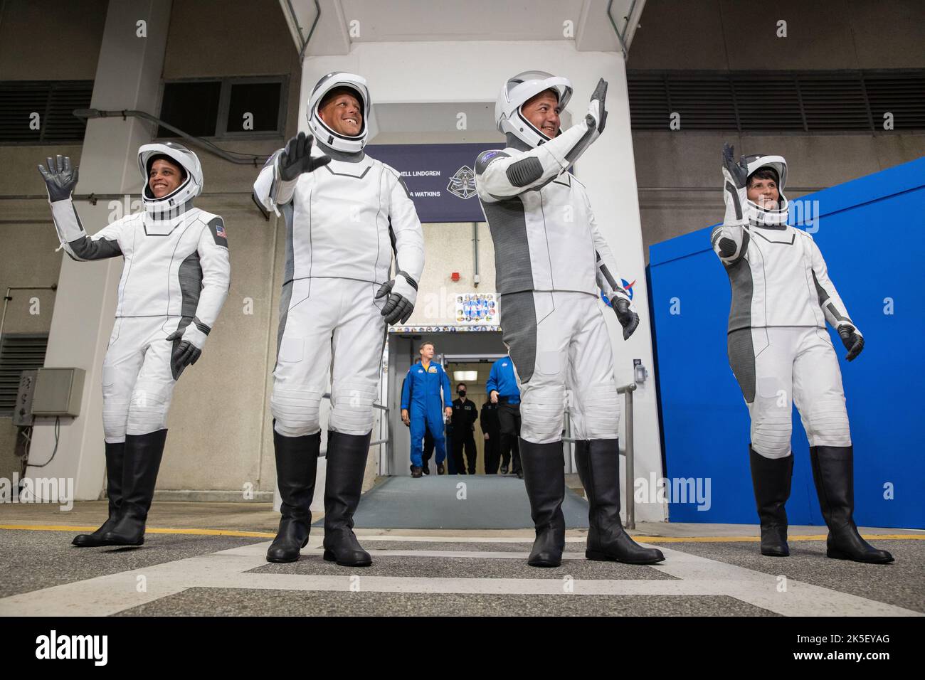 Crew-4 astronauts wave after walking out through the double doors below ...