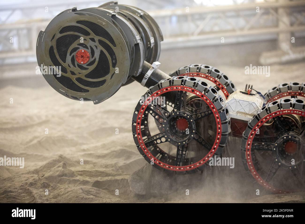 The ISRU Pilot Excavator digs its way through the regolith bin during ...