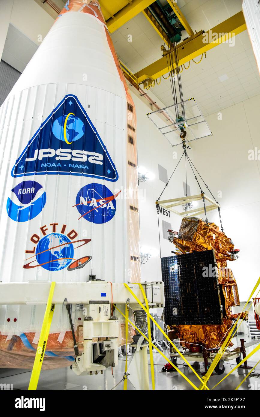 A crane is used to lift NASA and the National Oceanic and Atmospheric Administration’s (NOAA ...