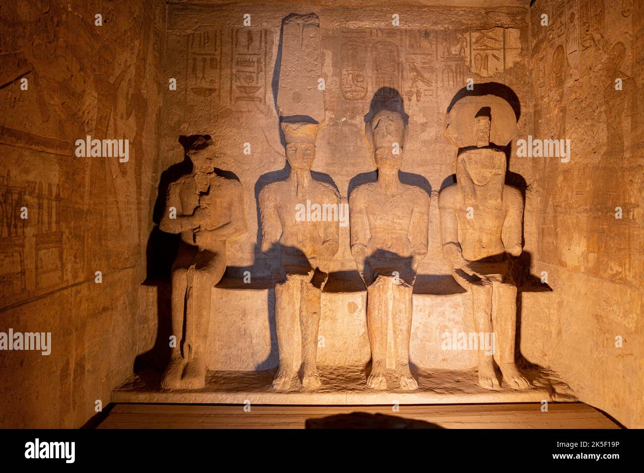 Statues in a shrine inside an Egyptian temple Stock Photo - Alamy