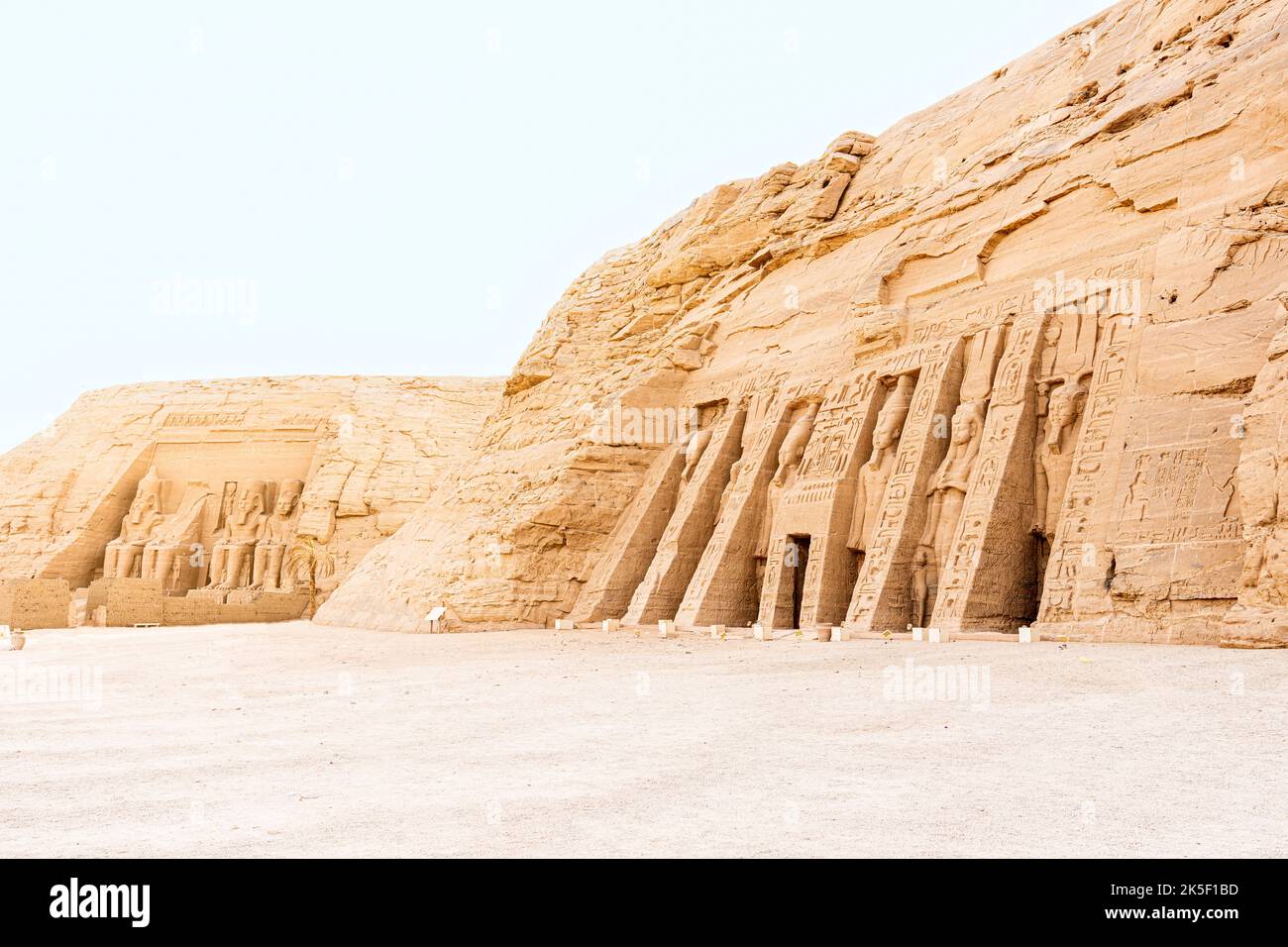 Esplanade with two egyptian temples in Abu Simbel Stock Photo - Alamy