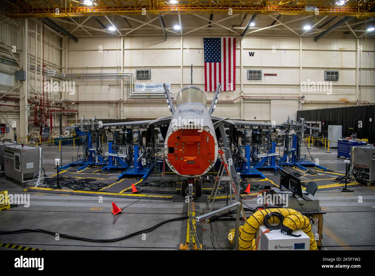 This front view shows the wing loading test configuration and testing ...