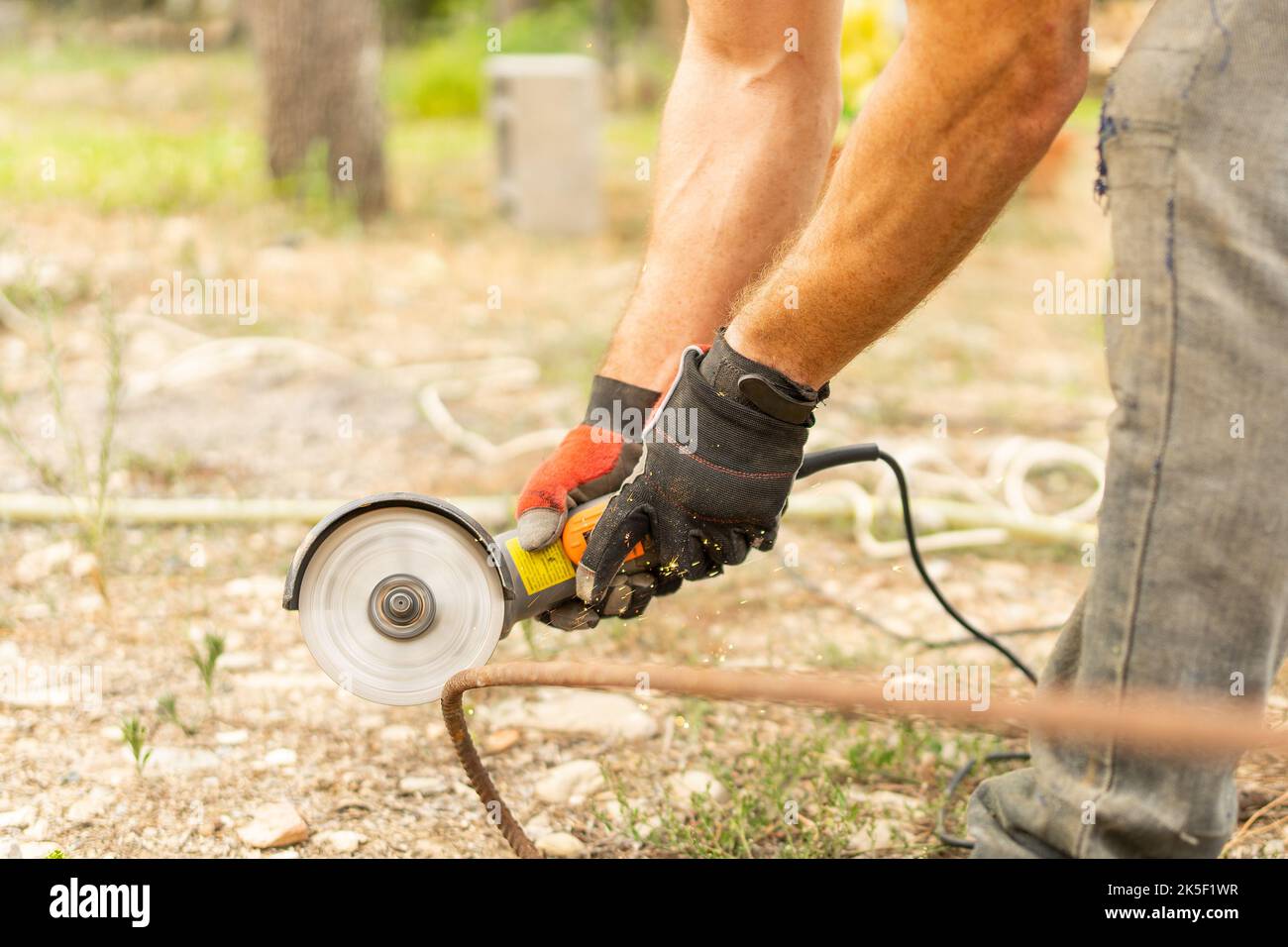 Person using hand saw cut hi-res stock photography and images - Alamy