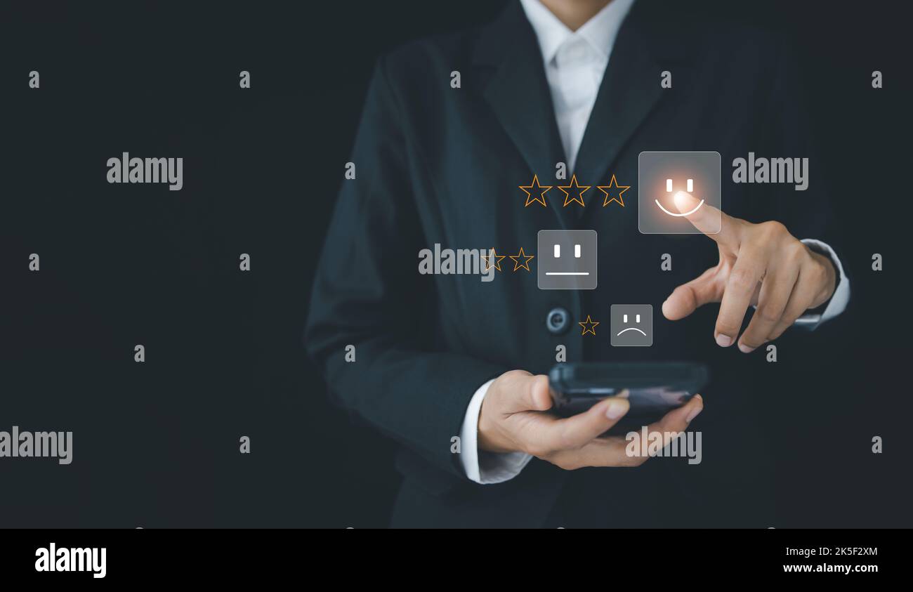 Customer service evaluation concept. business woman hand is pressing ...