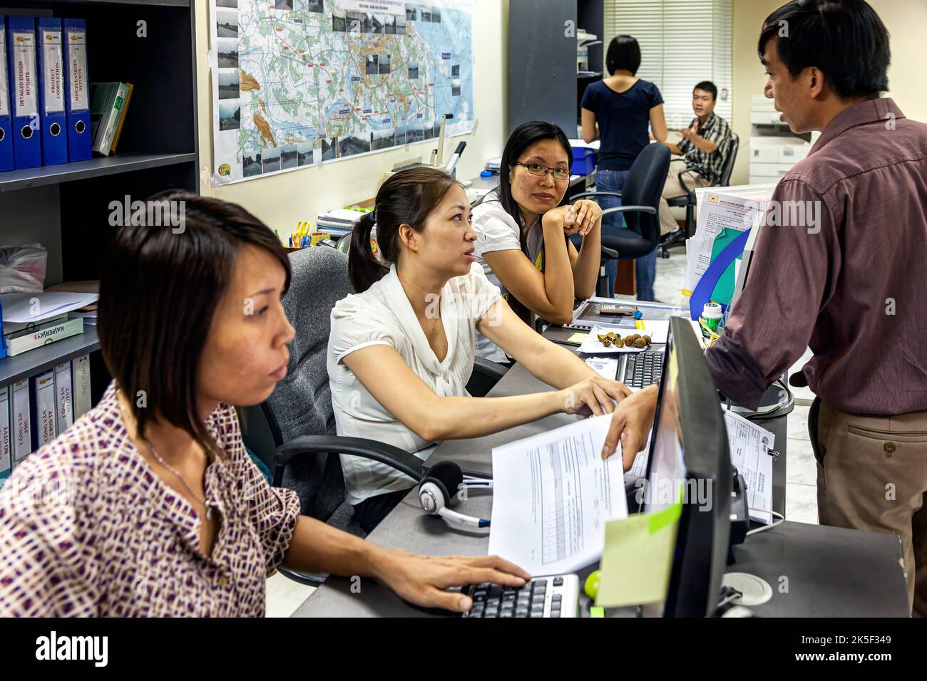 Vietnamese office workers using computer, Hai Phong, Vietnam Stock ...