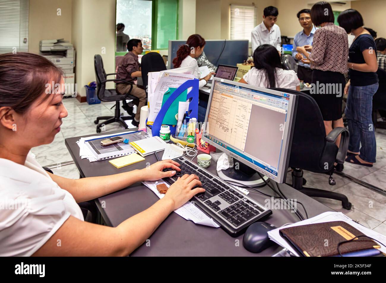Vietnamese office workers using computer, Hai Phong, Vietnam Stock ...