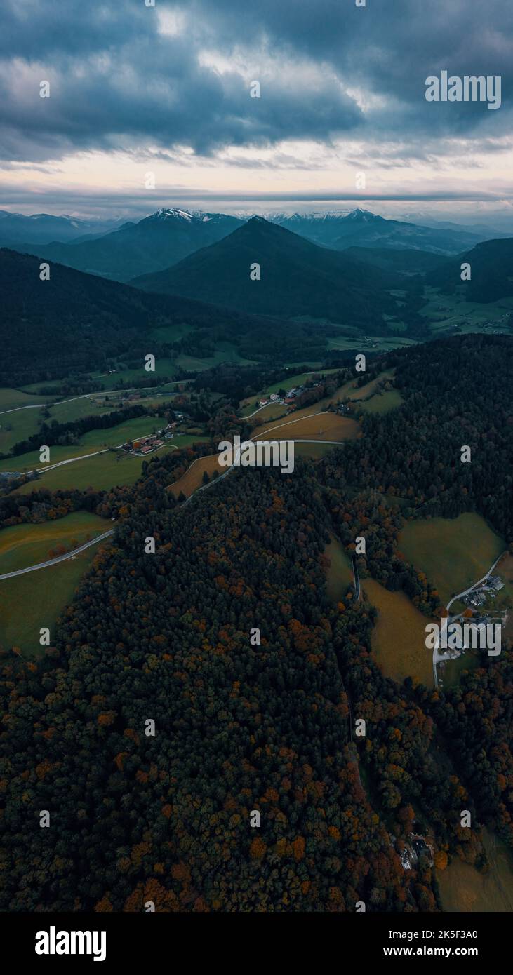 A vertical aerial view of a mountainous landscape in a rural area in ...