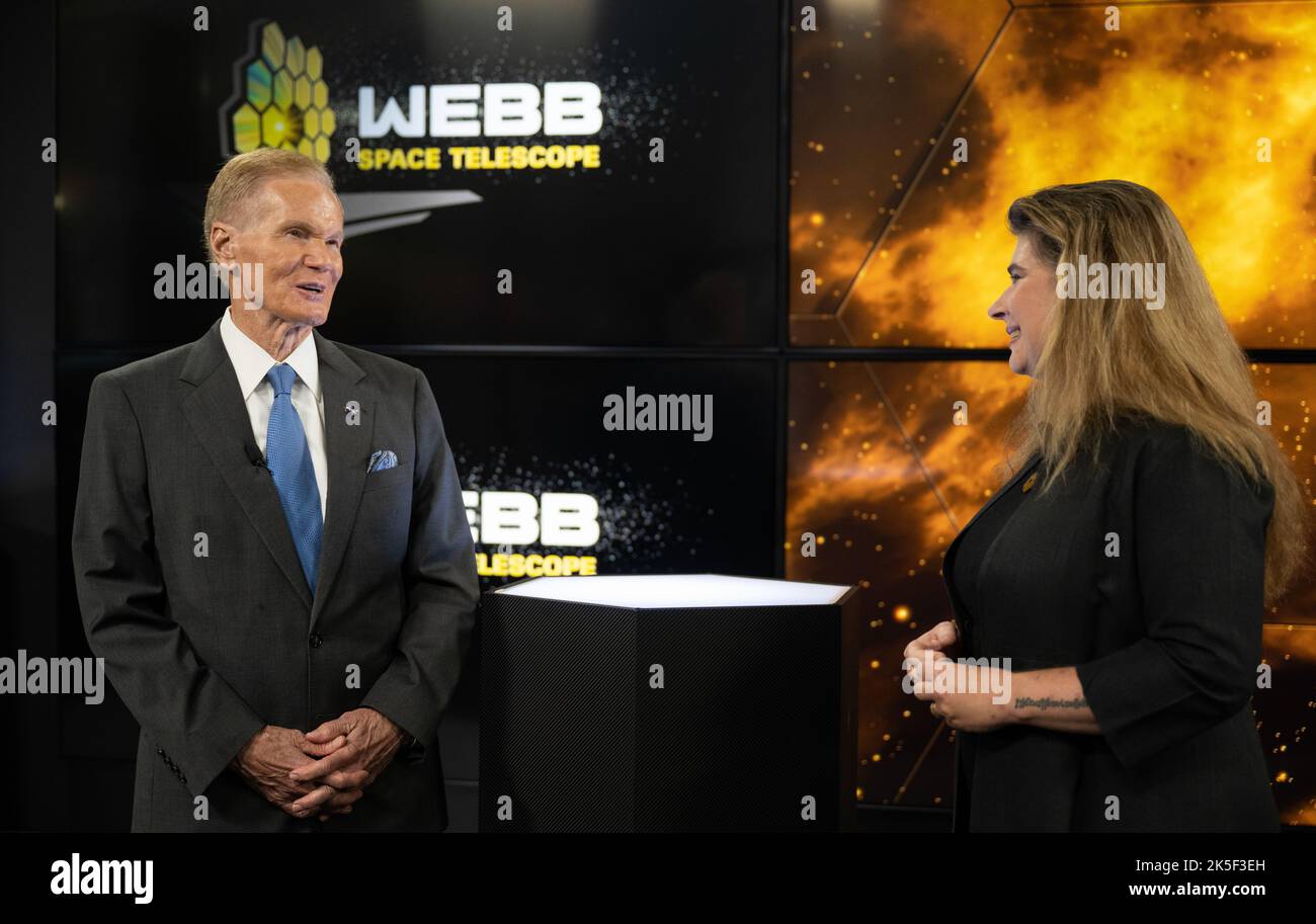 NASA Administrator Bill Nelson, left, speaks with Assistant Director of ...