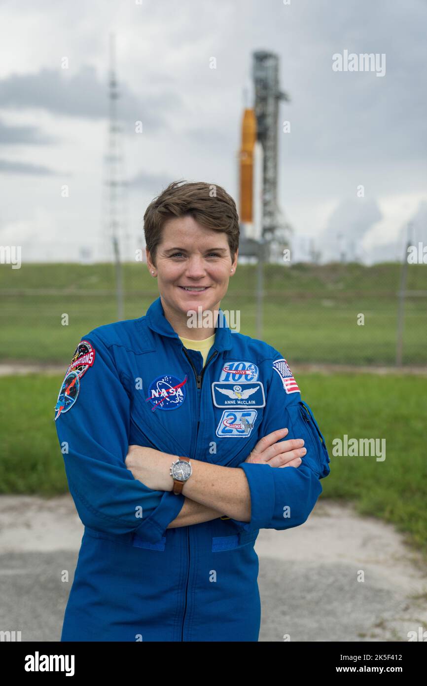 NASA astronaut Anne McClain poses for a photograph in front of NASA’s ...