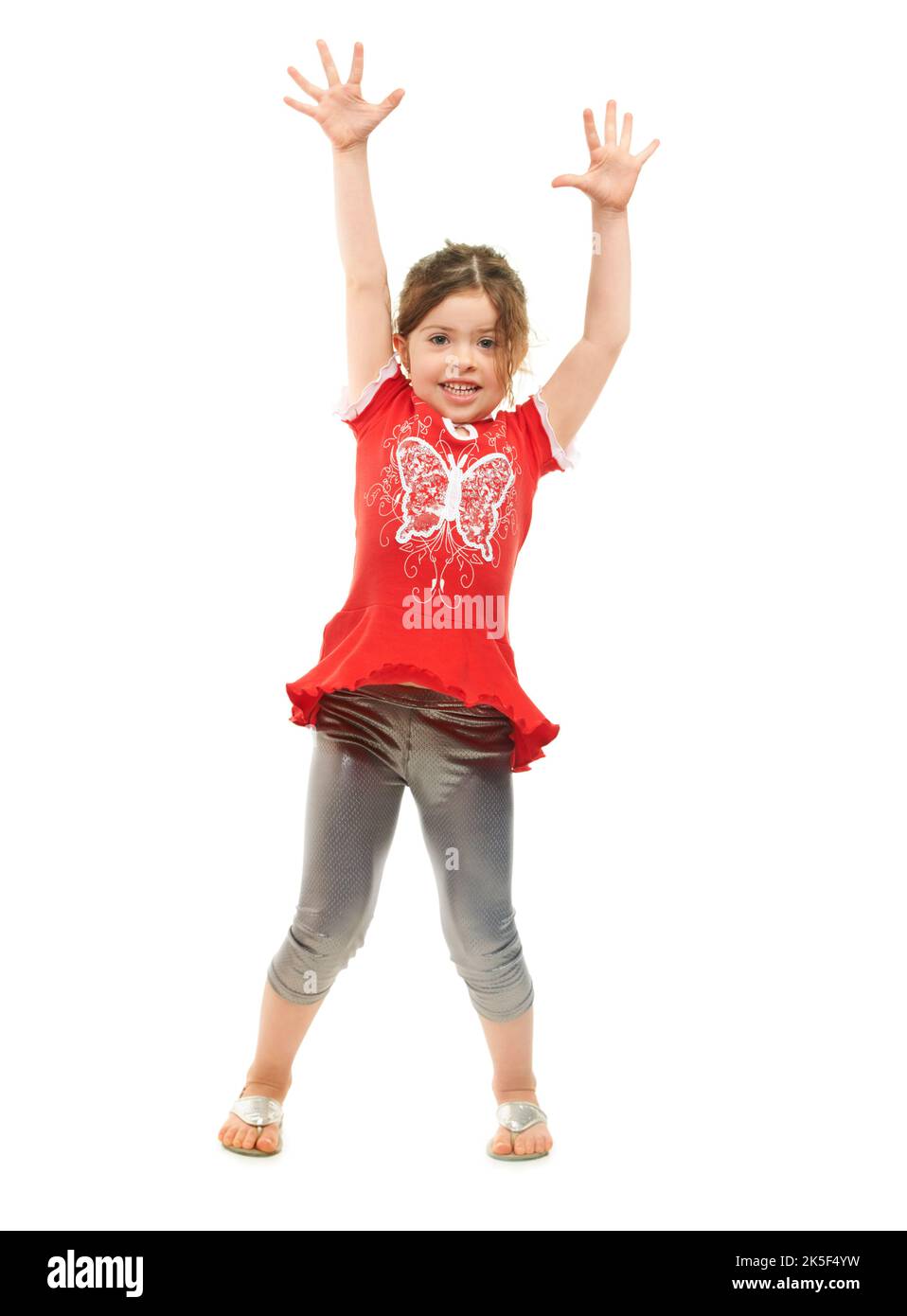 Im excited. Cute little girl expressing excitement against a white ...