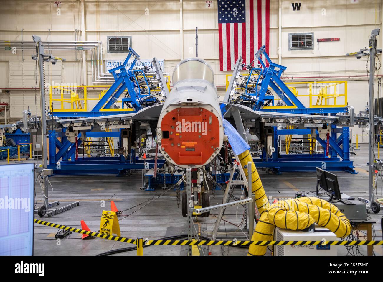 This is a front view of the vertical tail loads testing on a Navy F/A ...