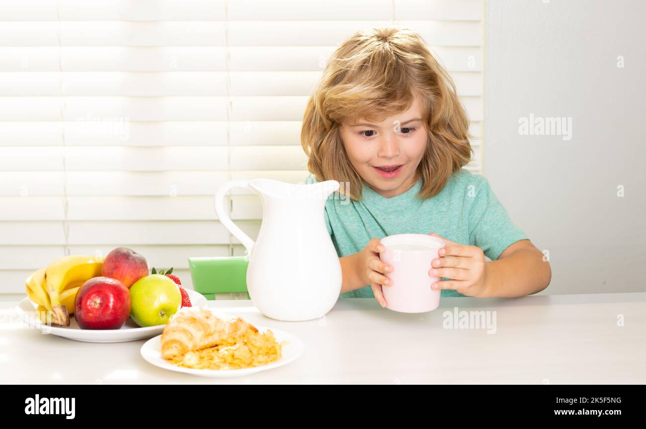 Little child boy having healthy breakfast. Kids nutrition and ...