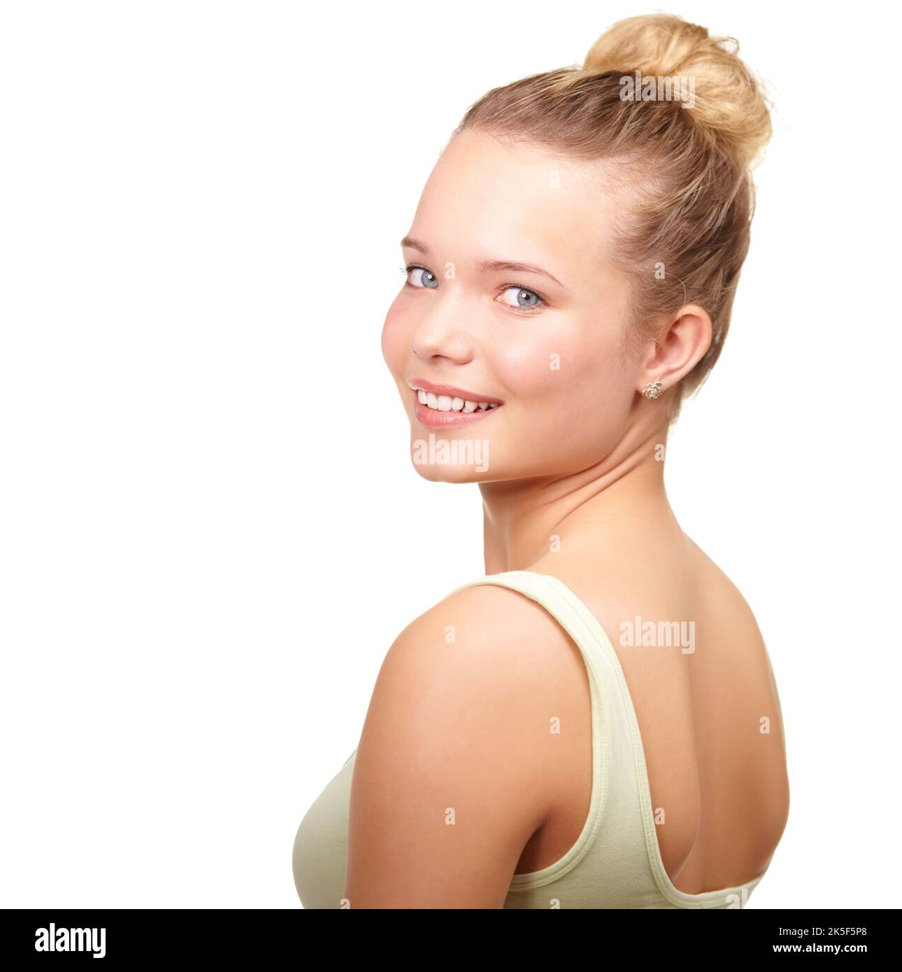 Bright smiles and happiness. Portrait of a pretty teenage girl looking ...