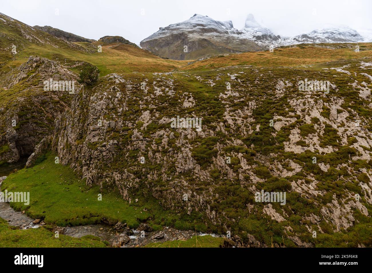Landscape of snow-capped Pyrenean peaks, in the Ossau valley, in Béarn ...