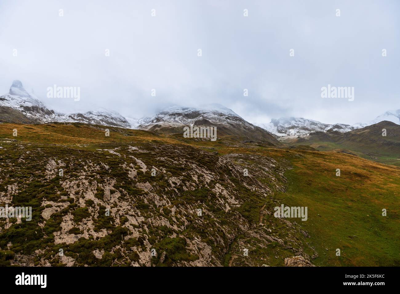 Landscape of snow-capped Pyrenean peaks, in the Ossau valley, in Béarn ...