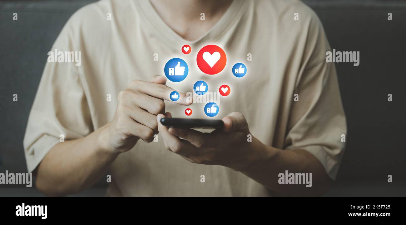 Chat and notification on smartphone with virtual red heart and blue ...
