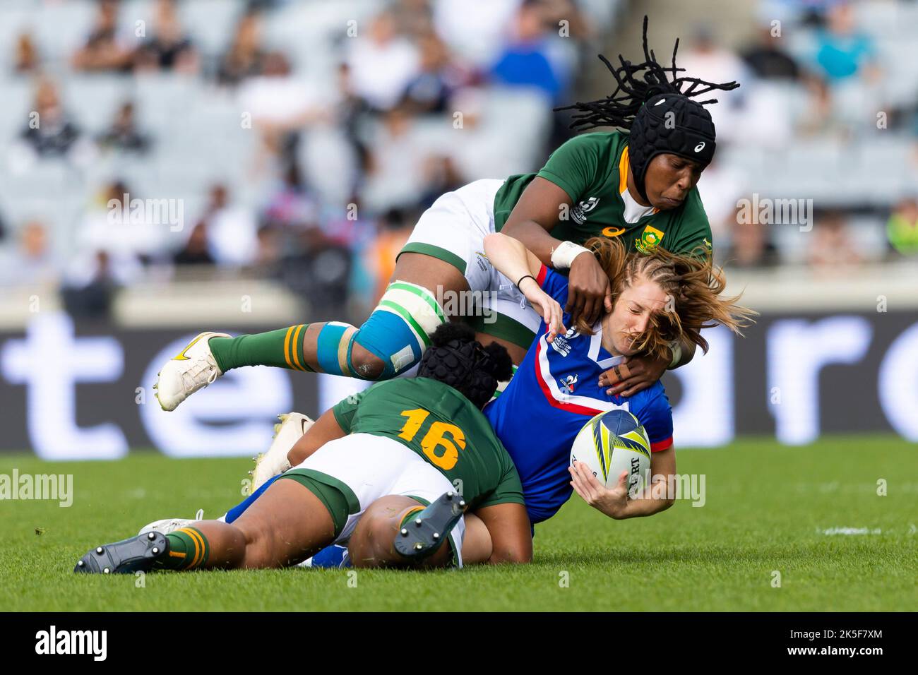 France's Pauline Bourdon is tackled by South Africa's Roseline Botes ...