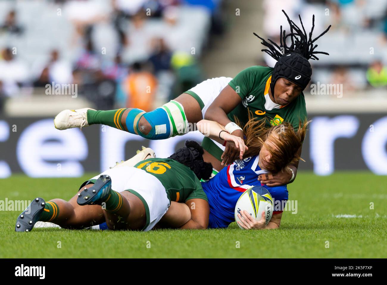 France's Pauline Bourdon is tackled by South Africa's Roseline Botes ...