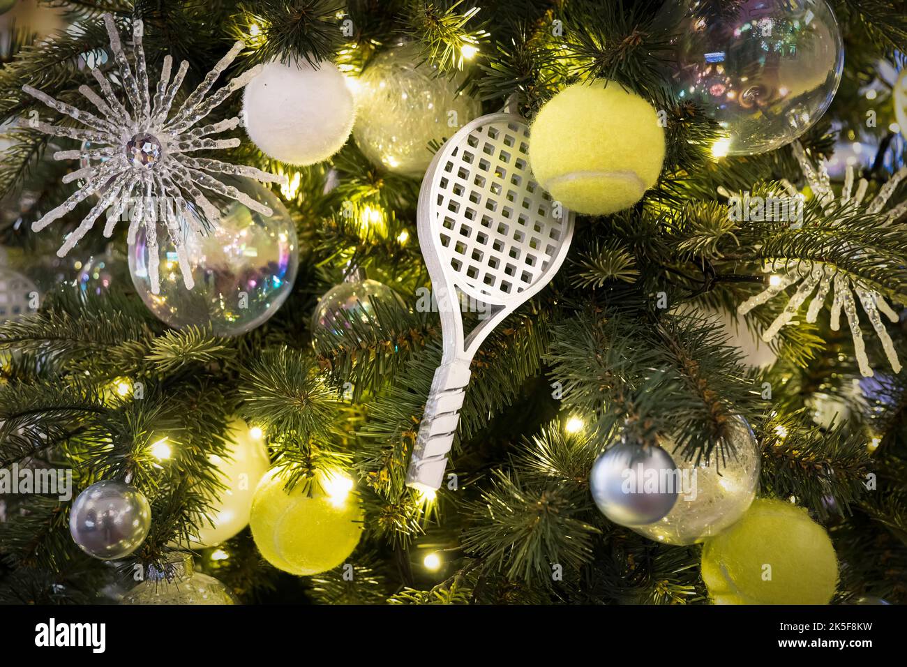 Decorated Christmas tree on blurred, sparkling and fairy background. a ...