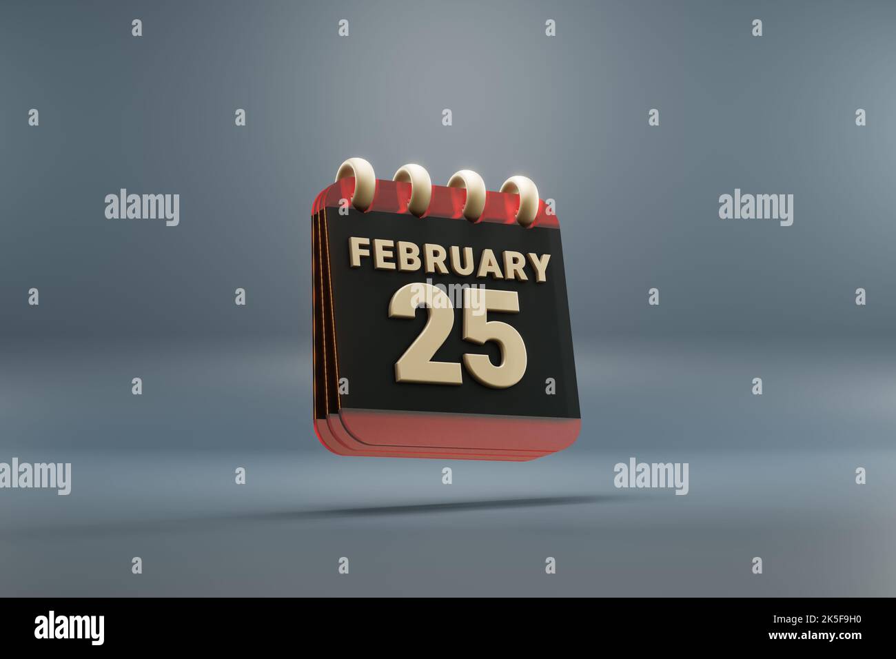 Standing black and red month lined desk calendar with date February 25 ...