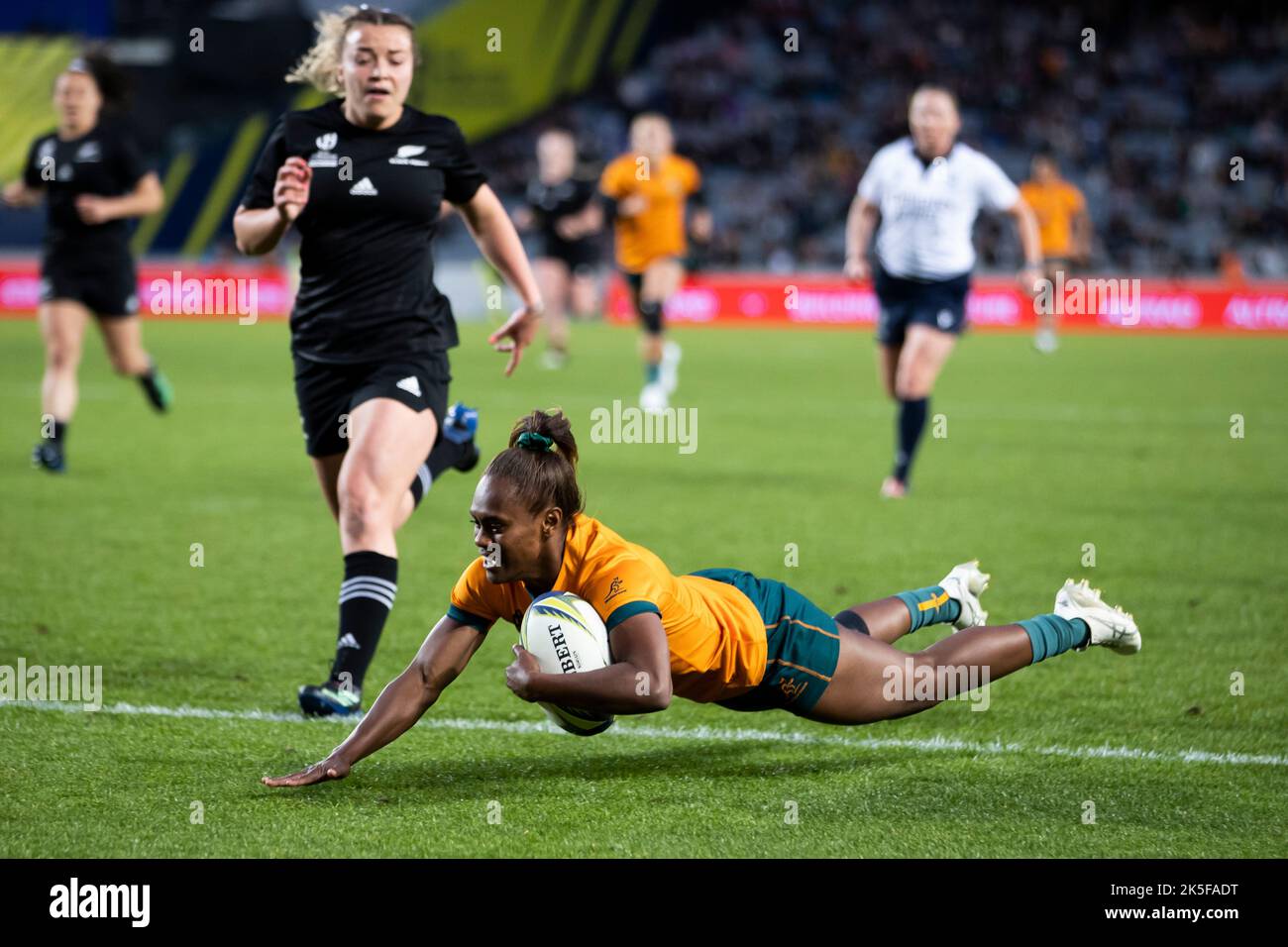 Australia S Ivania Wong Dives Over In The Corner To Score The Opening