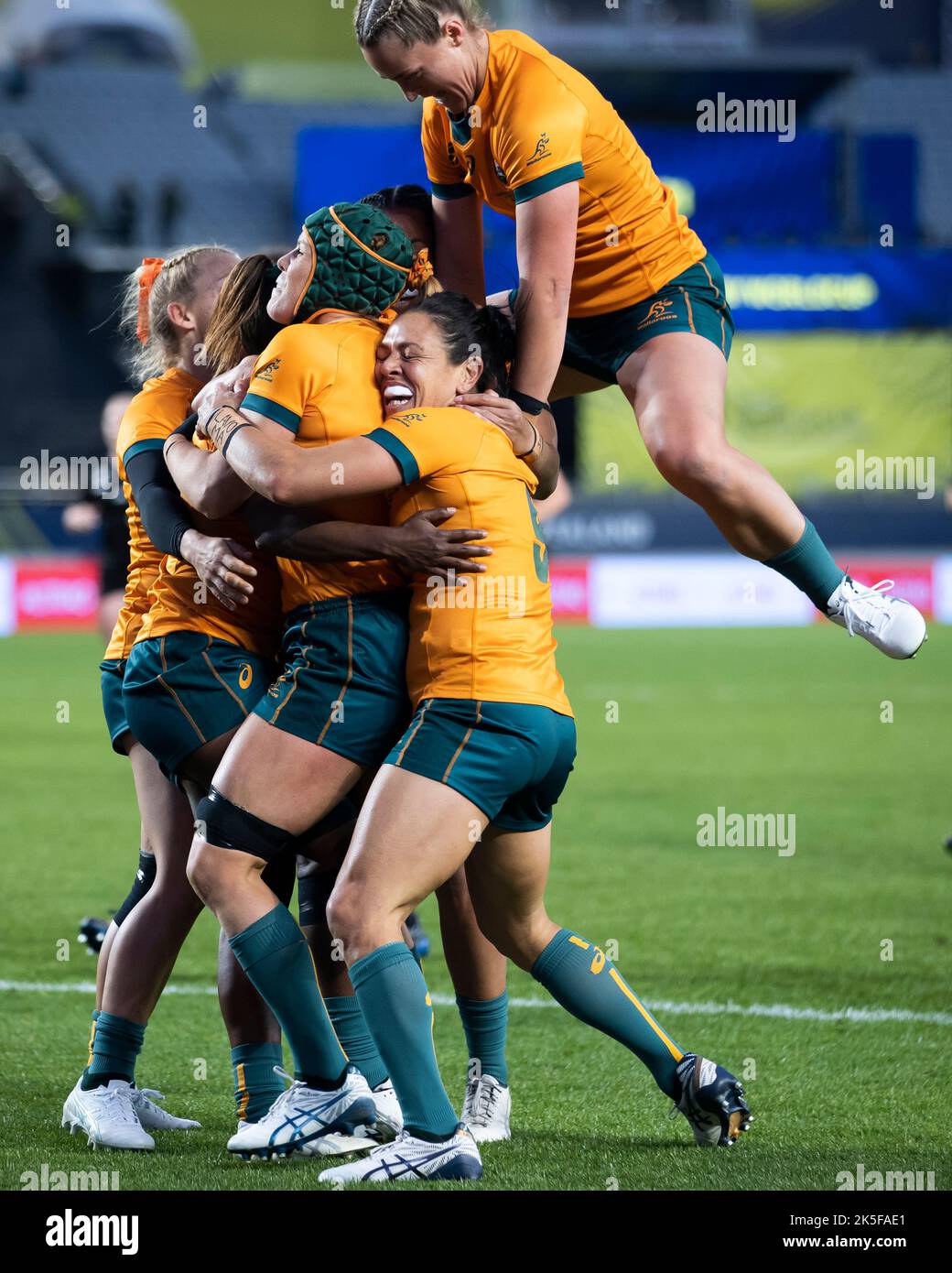 Australia's Ivania Wong celebrates with team mates after scoring a try ...