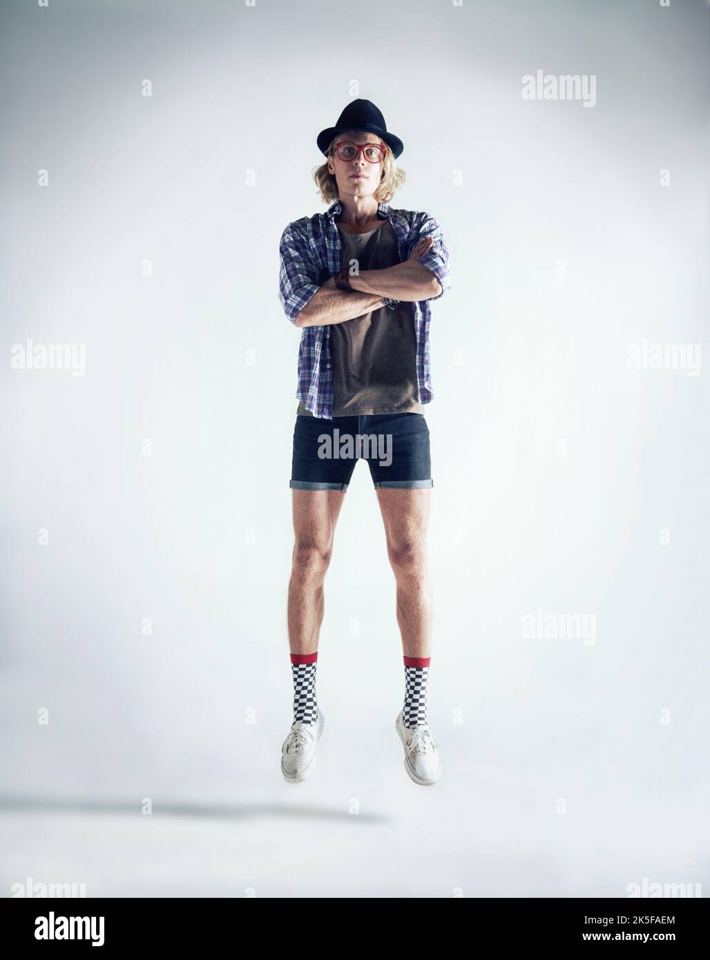 Elevated confidence. Portrait of a handsome young man floating just ...