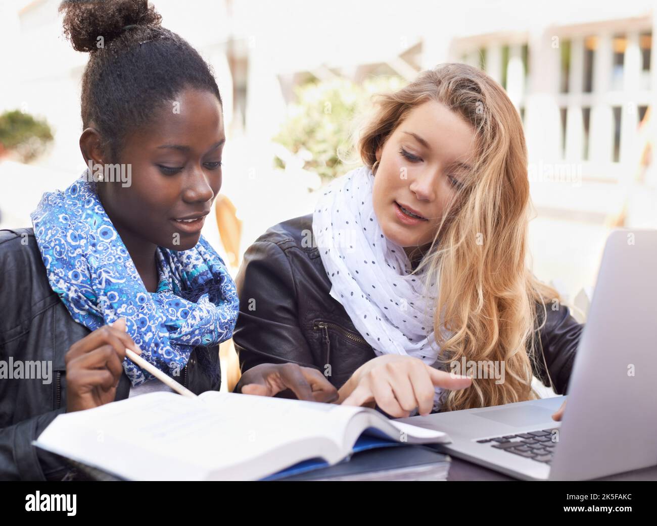 Doing what girls do. two young friends enjoying the day together Stock ...