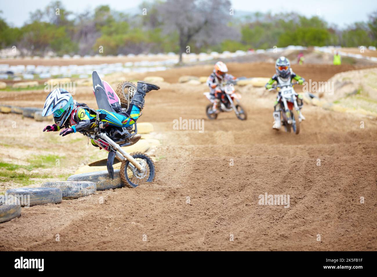 One wrong move and youre outta the race. A motocross rider taking a ...