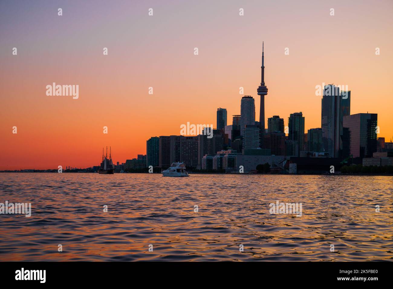 Toronto downtown cityscape with skyscrapers, white yacht and amazing ...