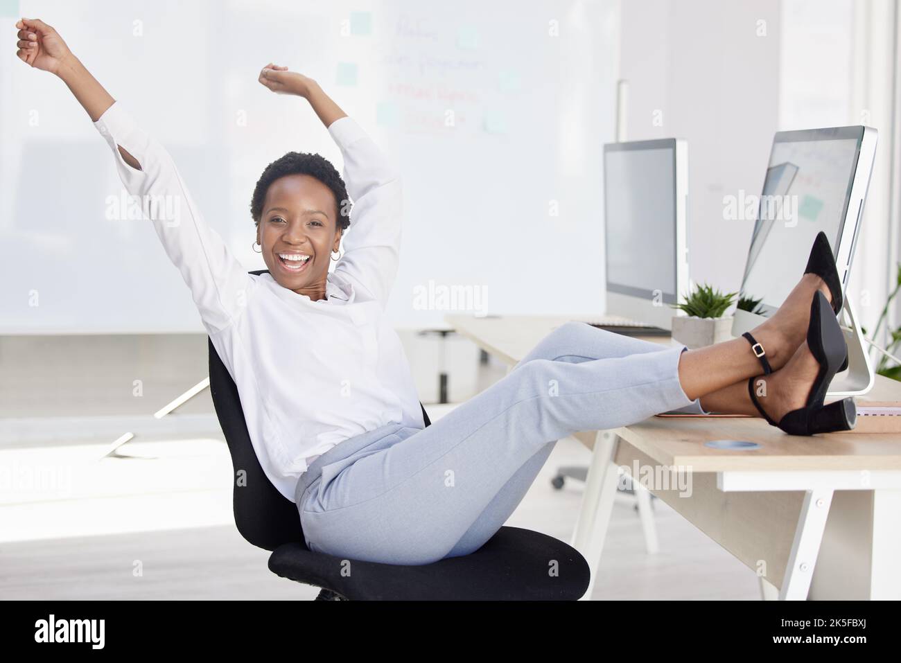 Happy, freedom celebrate and black business woman after a office work ...